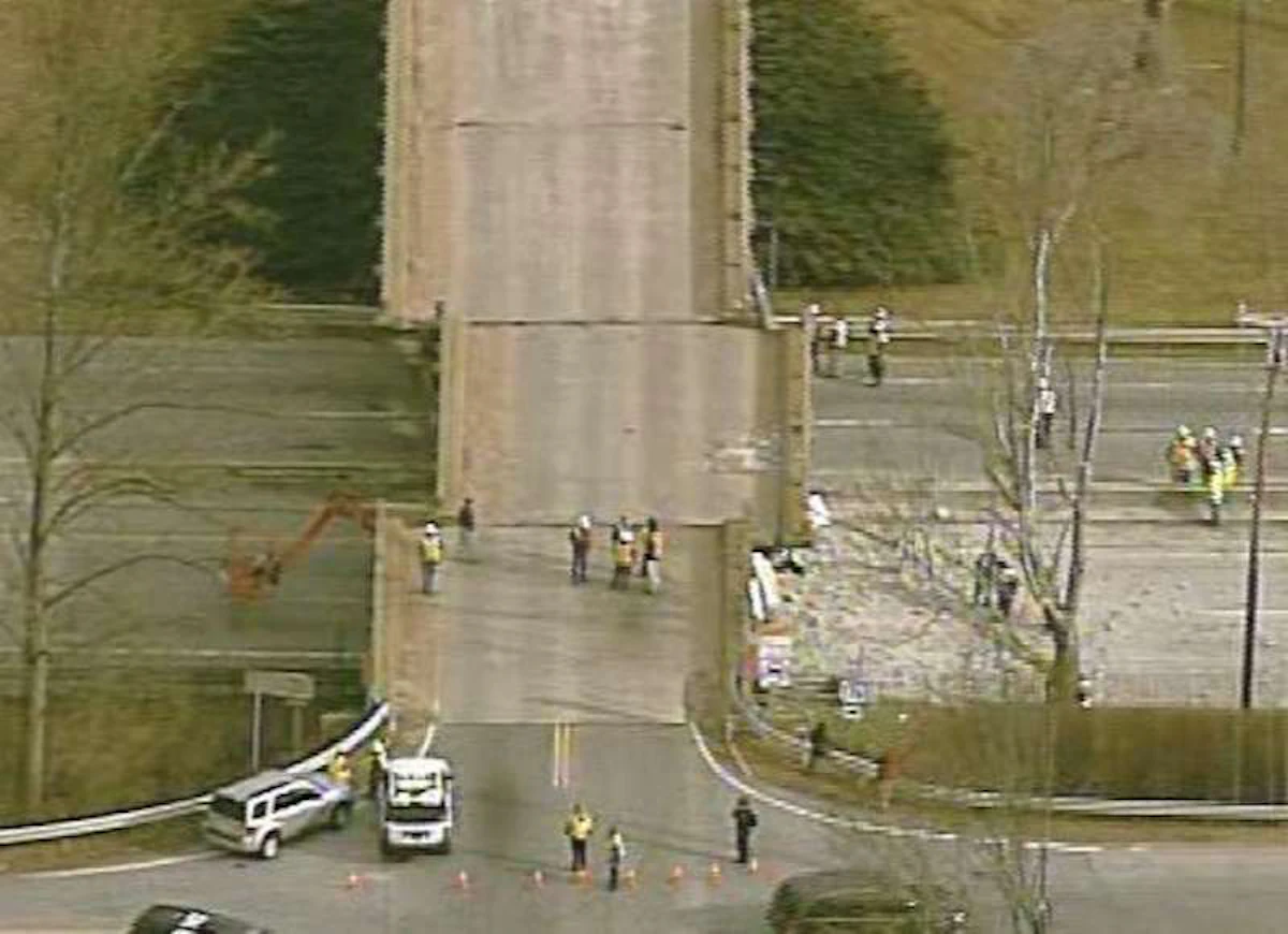 A truck hauling a boom lift hit a bridge so hard, the bridge shifted 5 ...