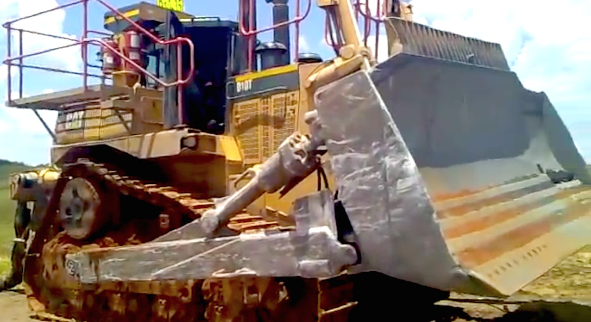 Cat D10 dozer and a loader rescue stuck 70-ton dumper like it’s no big ...