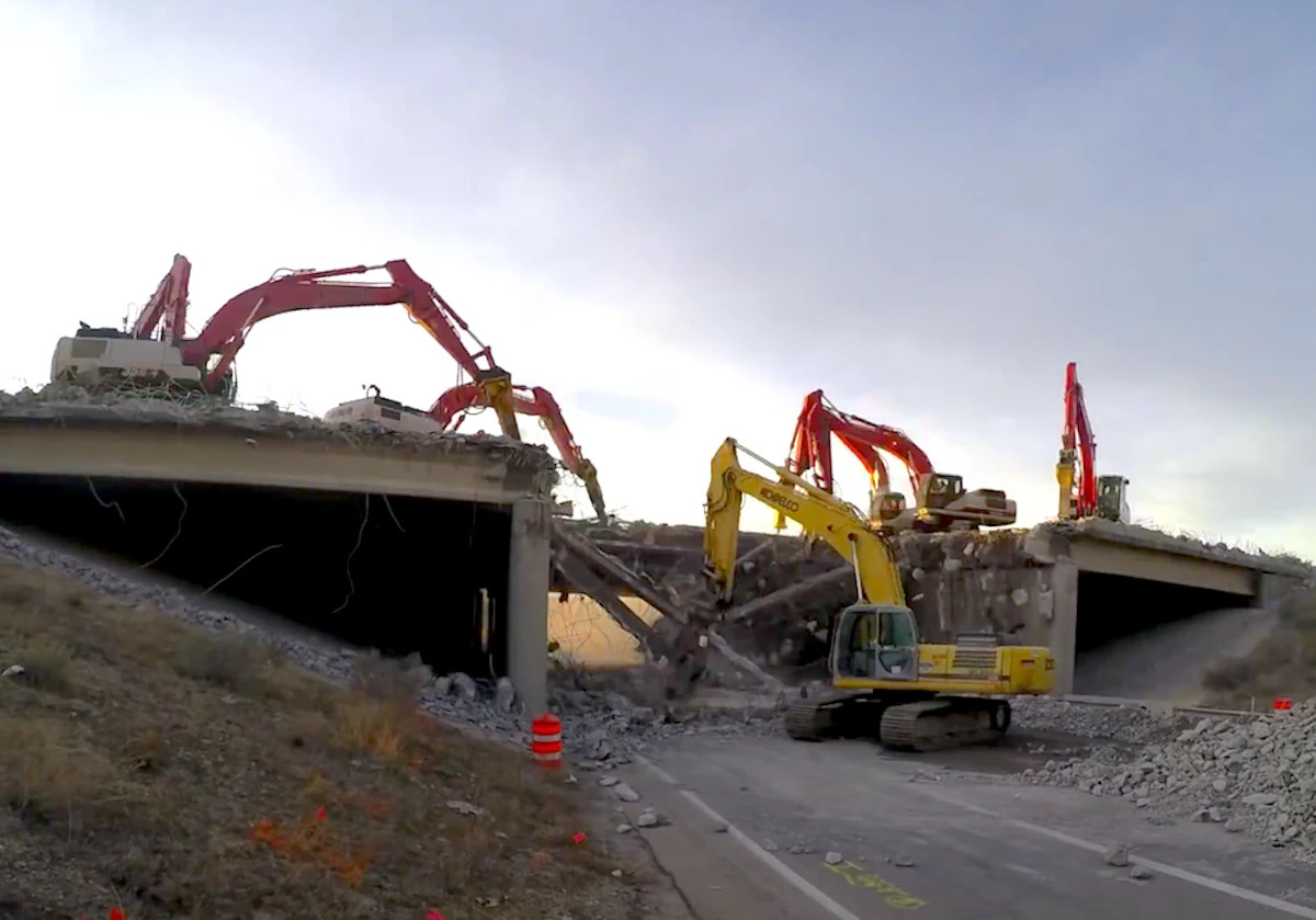 Squad of excavators chews up a bridge in 30-second demolition time ...