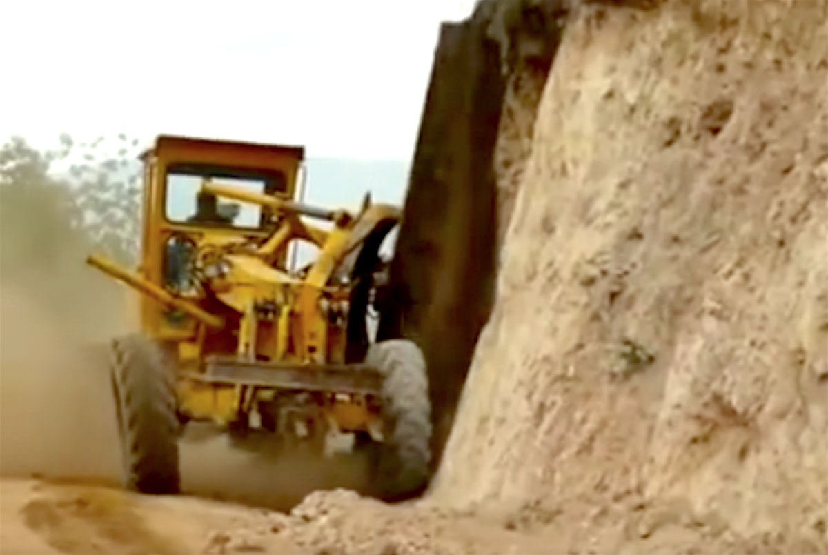 Graders go wheels up to tackle extreme sloping | Equipment World