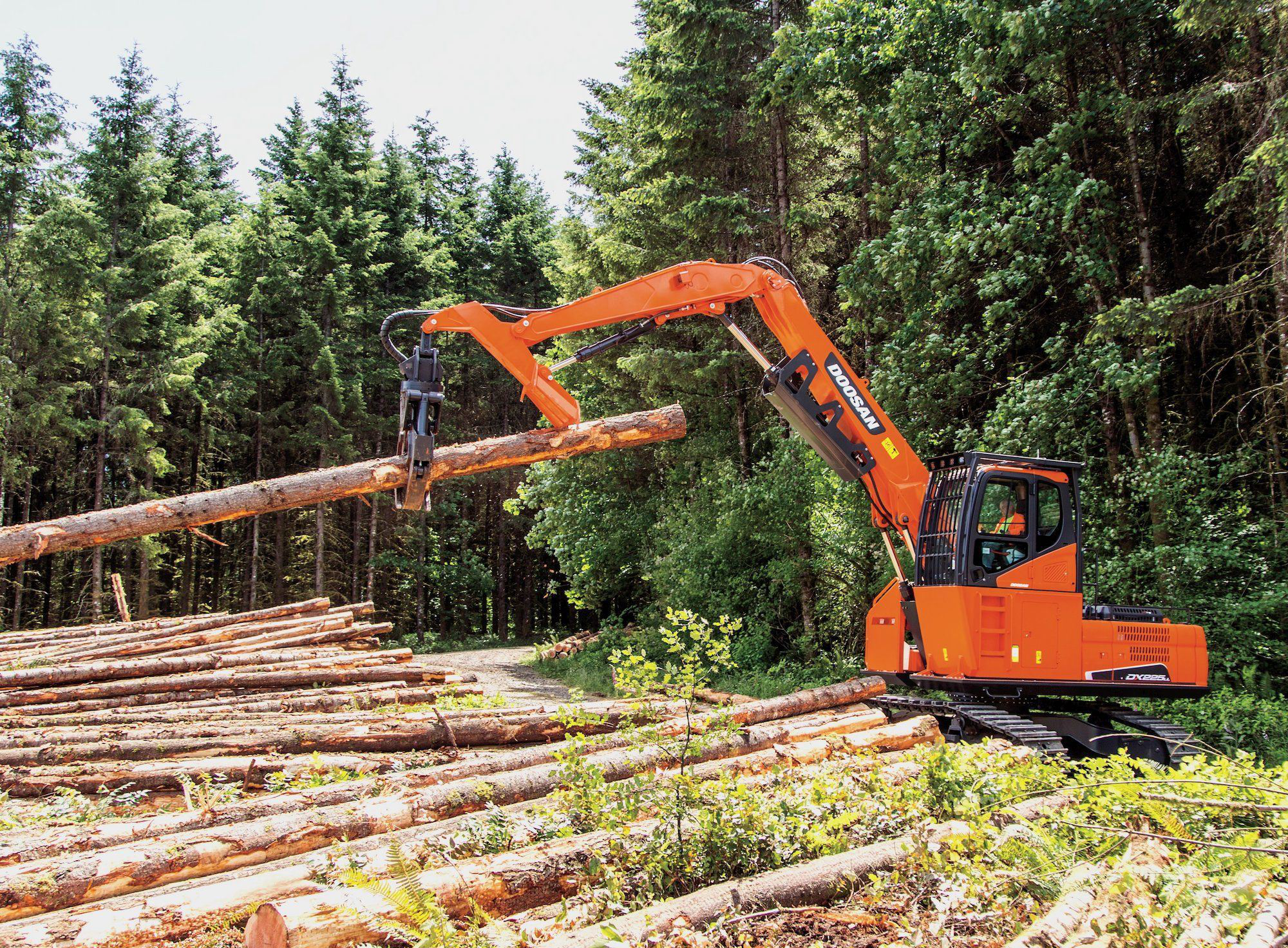 Doosan launches DX225LL-5 log loader with cab, engine improvements ...