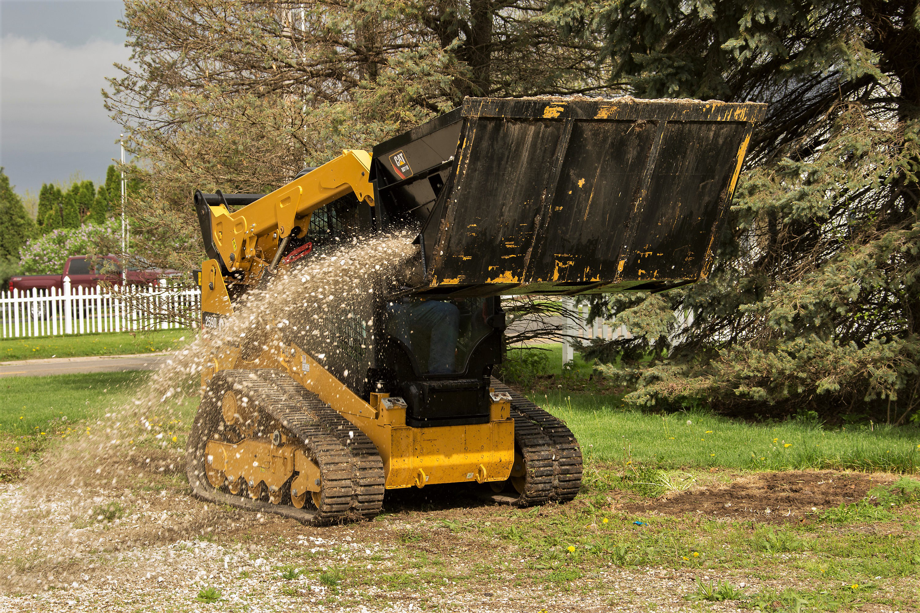 Caterpillar discharge buckets sling sand, sawdust and more | Equipment ...