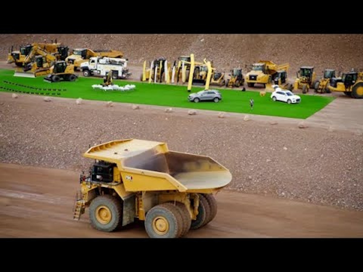 Caterpillar autonomous mining truck navigates obstacle course ...