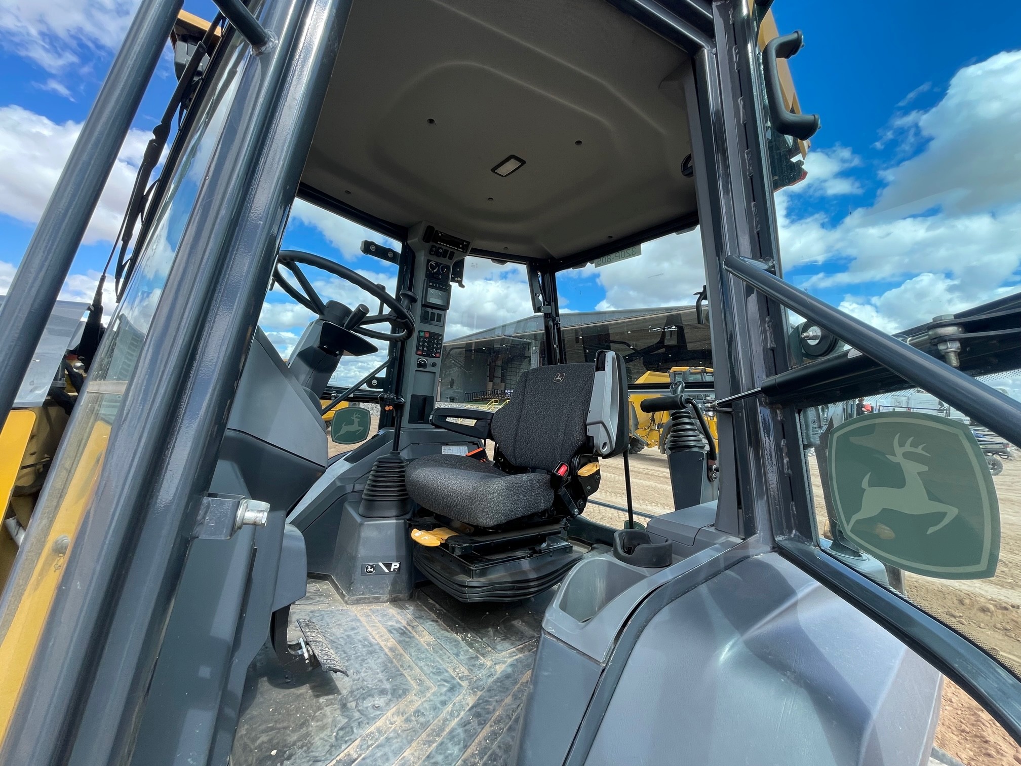 Deere revamps backhoe line, focusing on comfort, visibility | Equipment ...