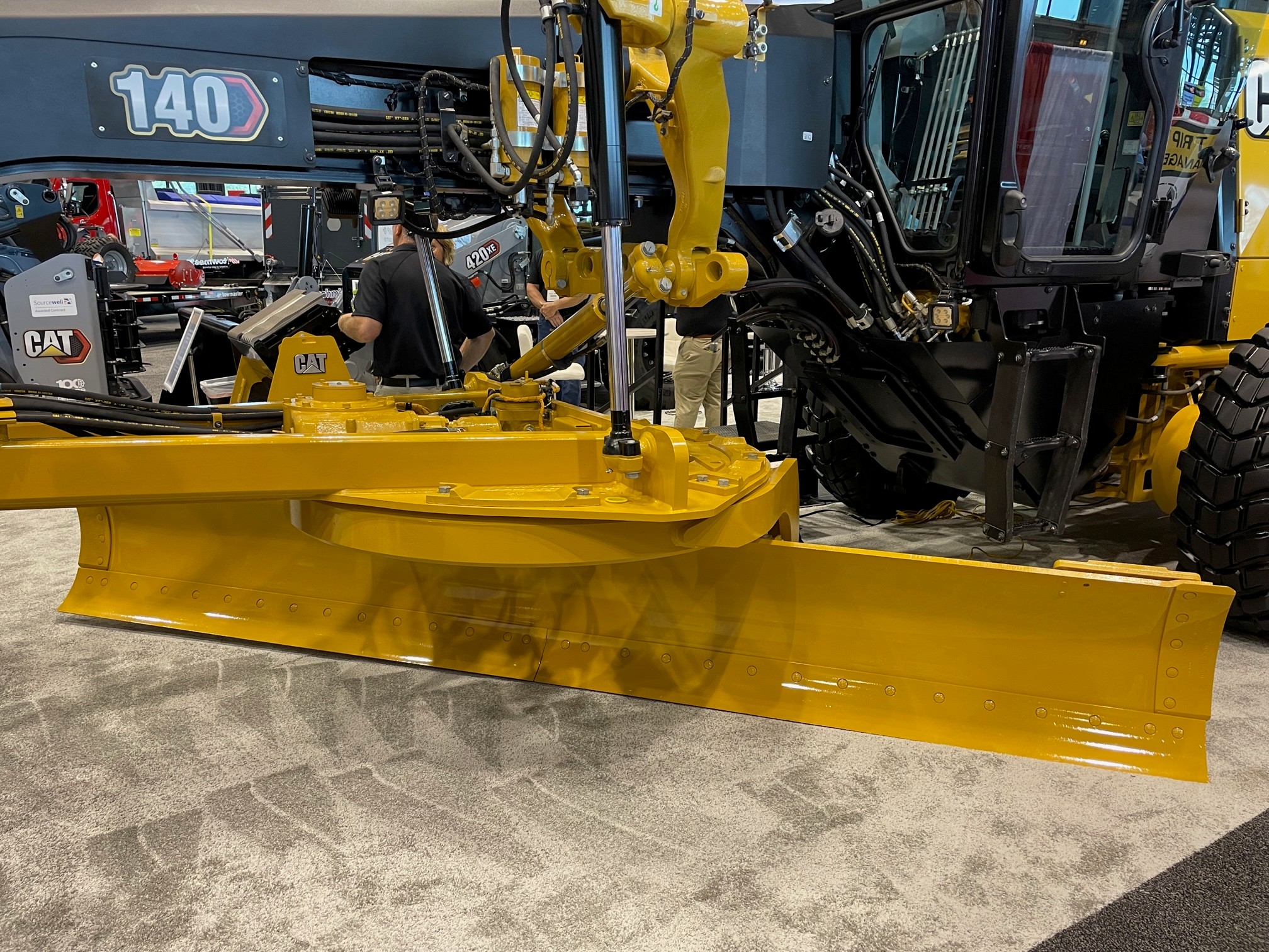 Cat 140 Lever Motor Grader debuts with new Cab, tech | Equipment World